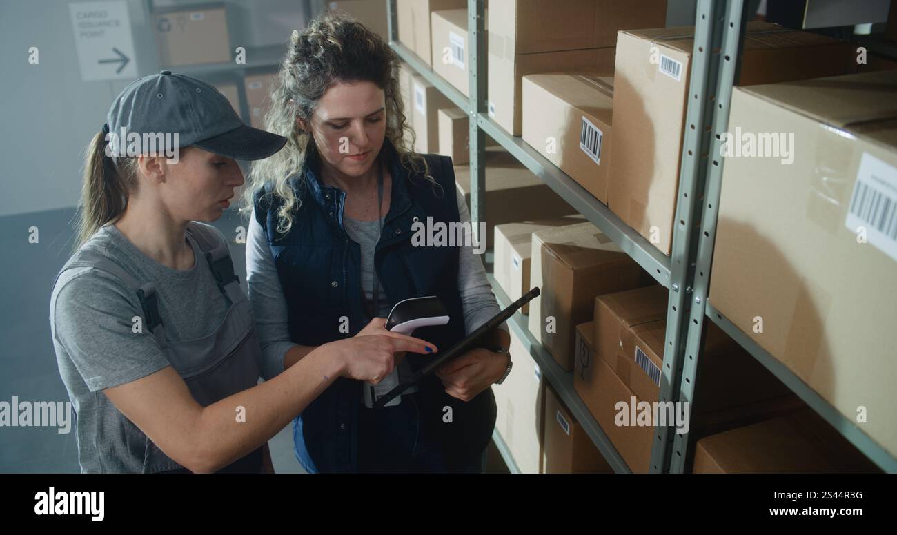Female Inventory Specialist and Sorting Center Worker Scanning Parcel ...