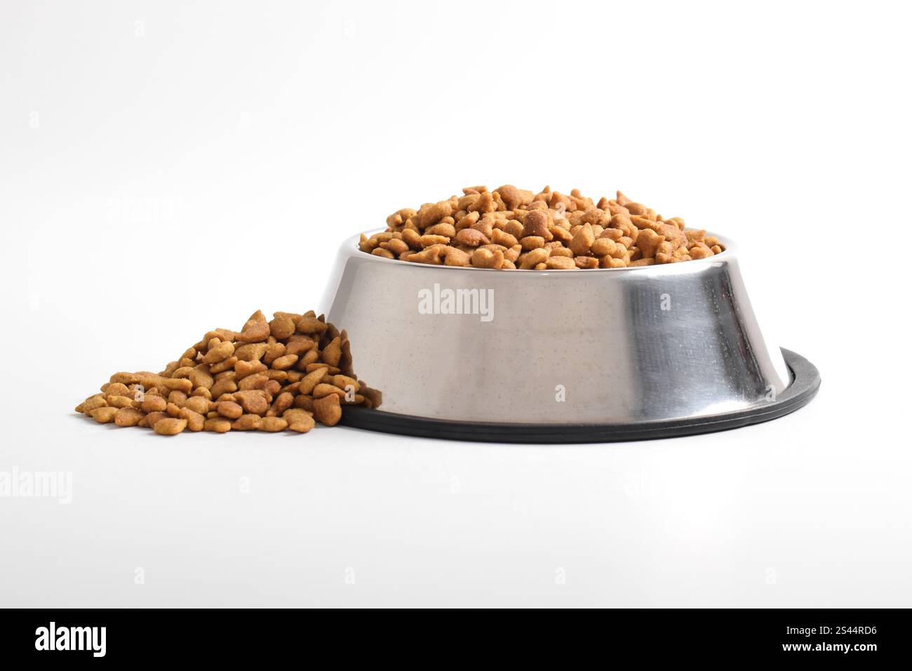 Dry food for cats in bowl isolated on white background. Brown cat ...