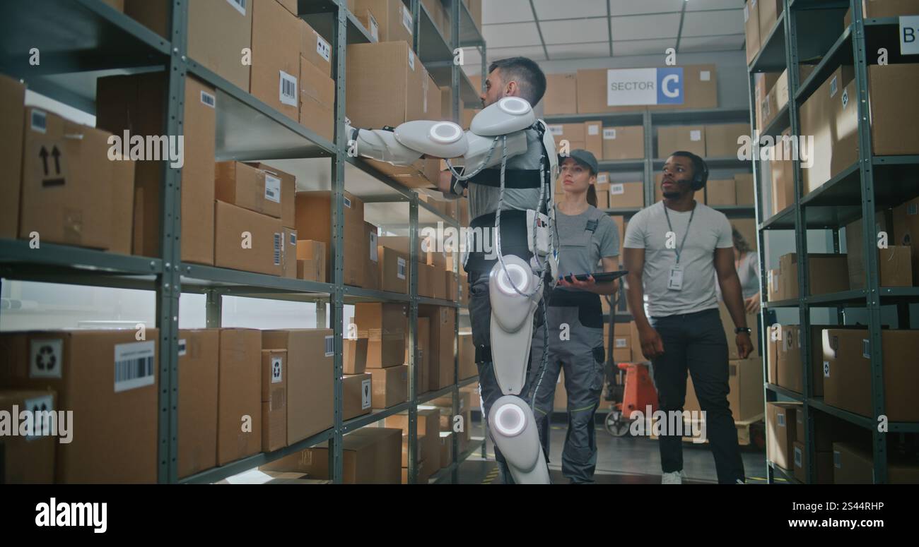 High-Tech Advanced Warehouse: Sorting Center Worker Wearing Futuristic ...