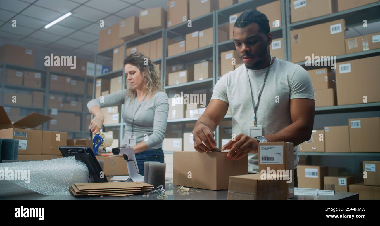 Worker scanning parcels in delivery hi-res stock photography and images ...