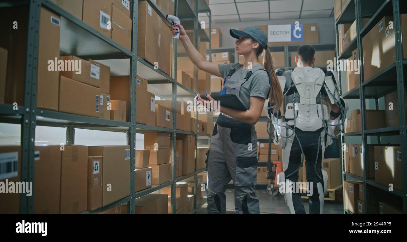 High-Tech Advanced Warehouse: Sorting Center Worker Wearing Futuristic ...