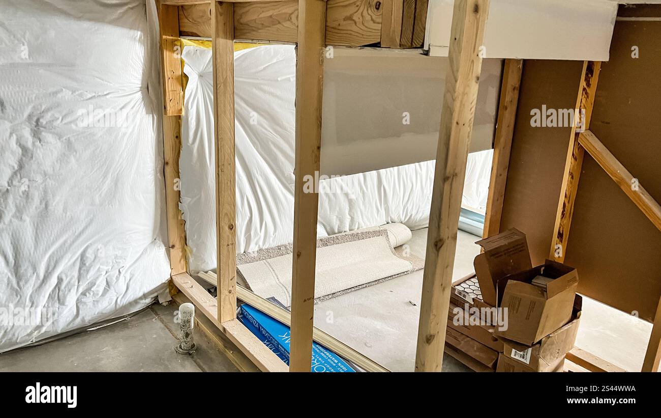 Unfinished Basement with Framing and Plumbing in New Home Construction ...