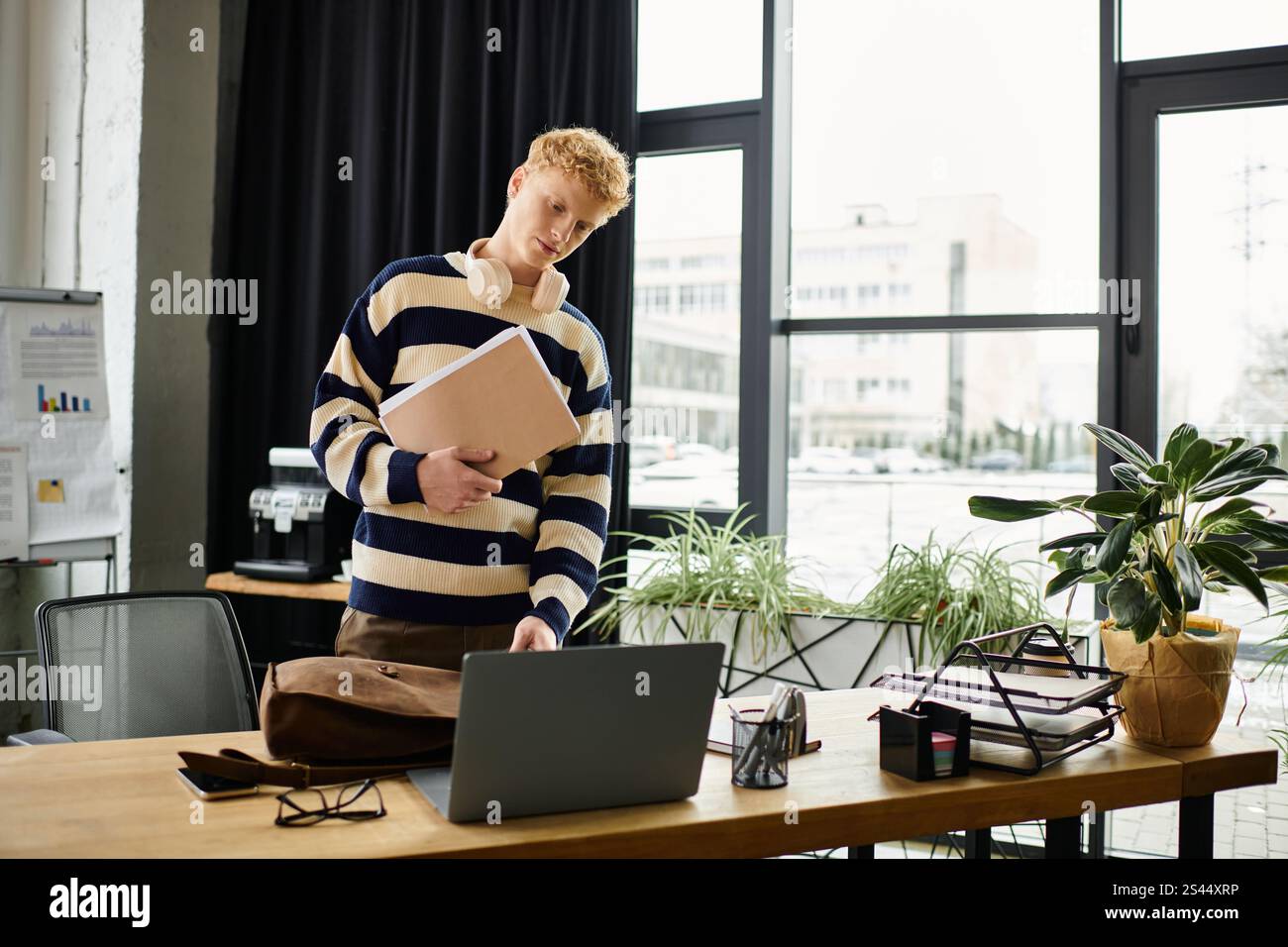 Professional man in sweater headphones hi-res stock photography and ...