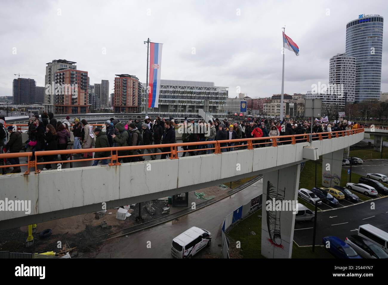 Students march during a protest over the collapse of a concrete canopy ...