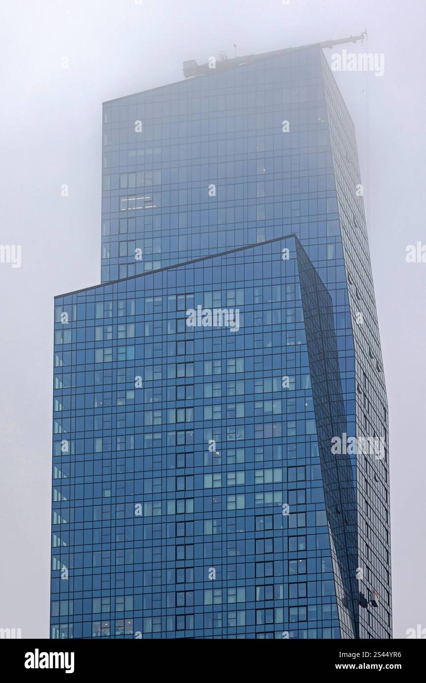 Skyscraper Tower Office Building in Fog Bad Weather Stock Photo - Alamy