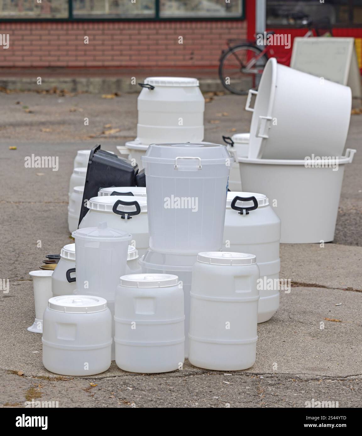 Various Size and Shape of White Plastic Drums and Barrels Gallon ...