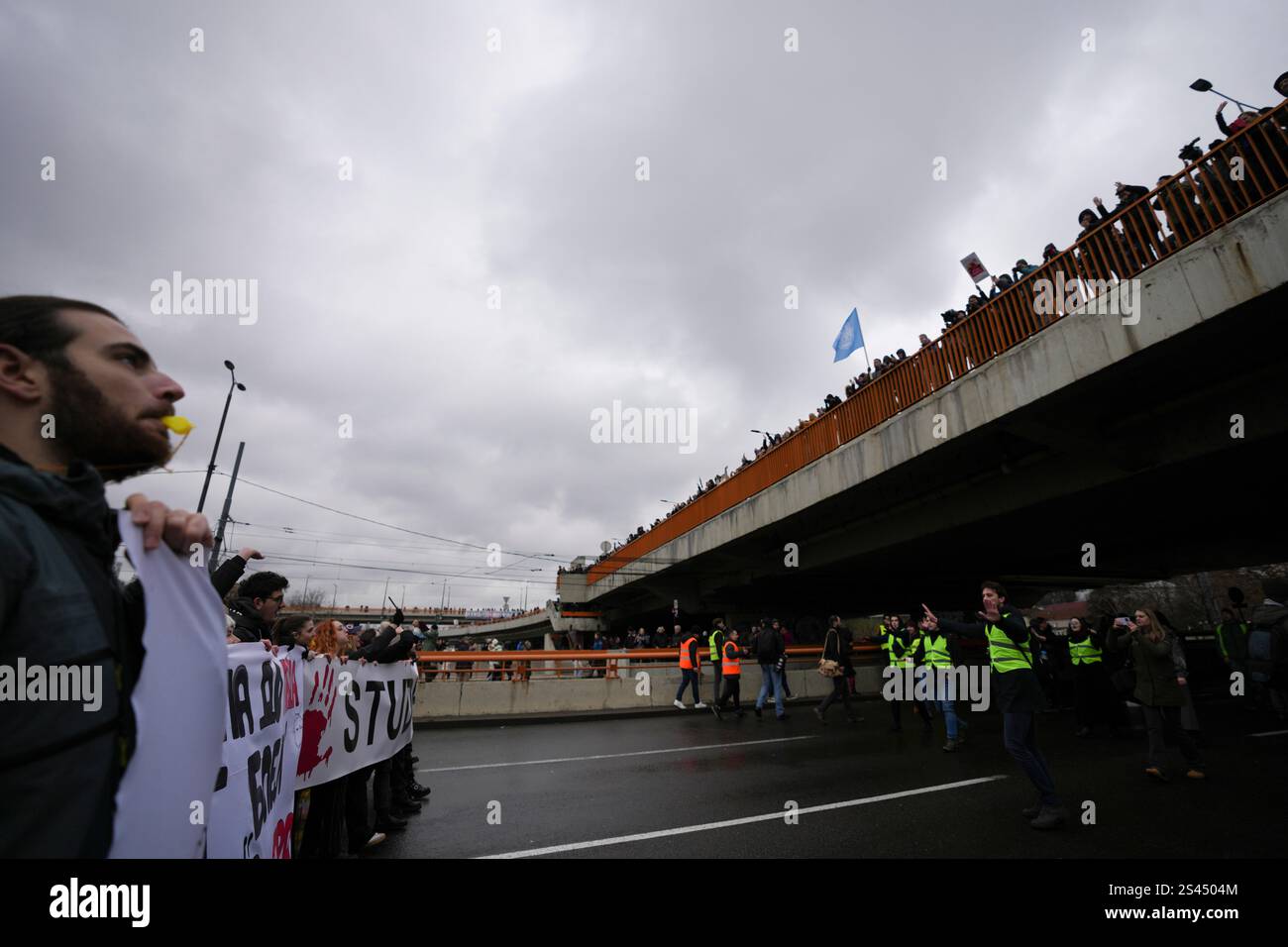 Students march during a protest over the collapse of a concrete canopy ...