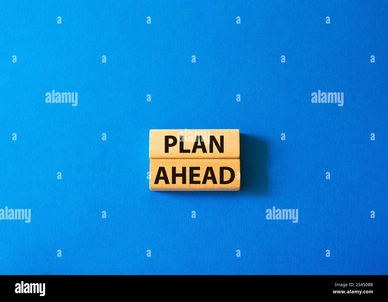 Plan ahead symbol. Wooden blocks with words Plan ahead. Beautiful blue ...