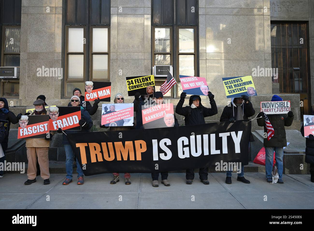 New York, USA. 10th Jan, 2025. Protestors stand with signs outside ...