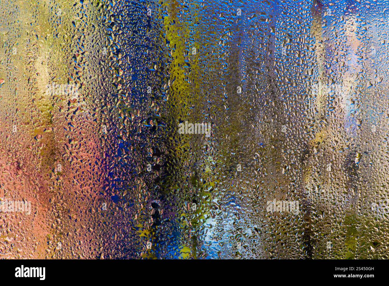 colored background of water droplets. condensation on the glass Stock ...