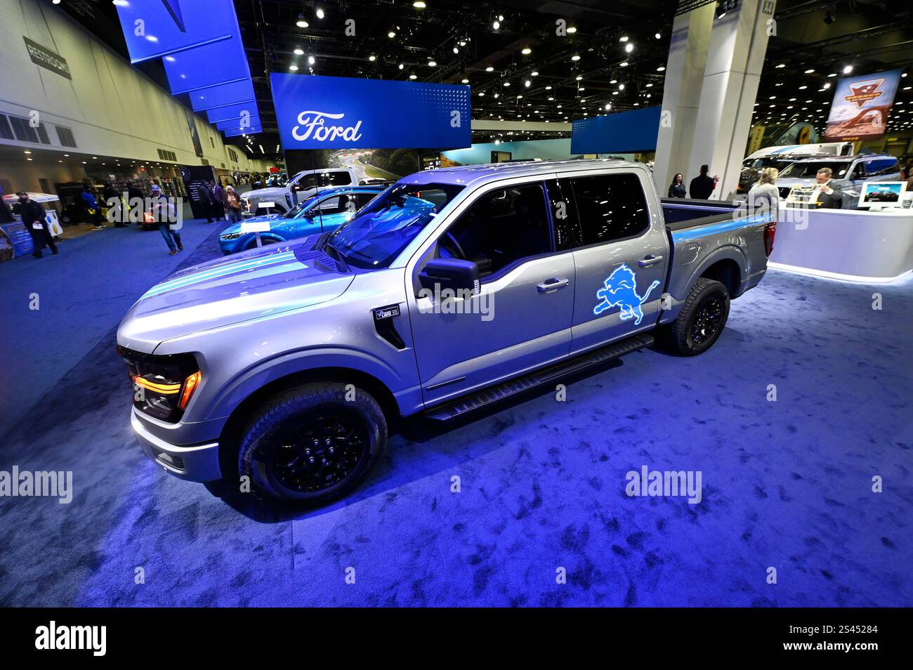 A limited edition Detroit Lions F-150 Hybrid is displayed as members of ...