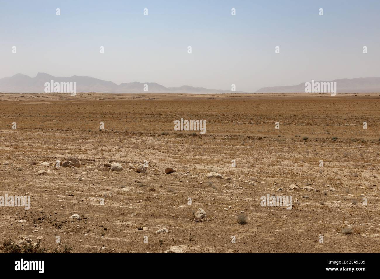 Dry terrain stretches across Kunduz Province, marked by rocky ...