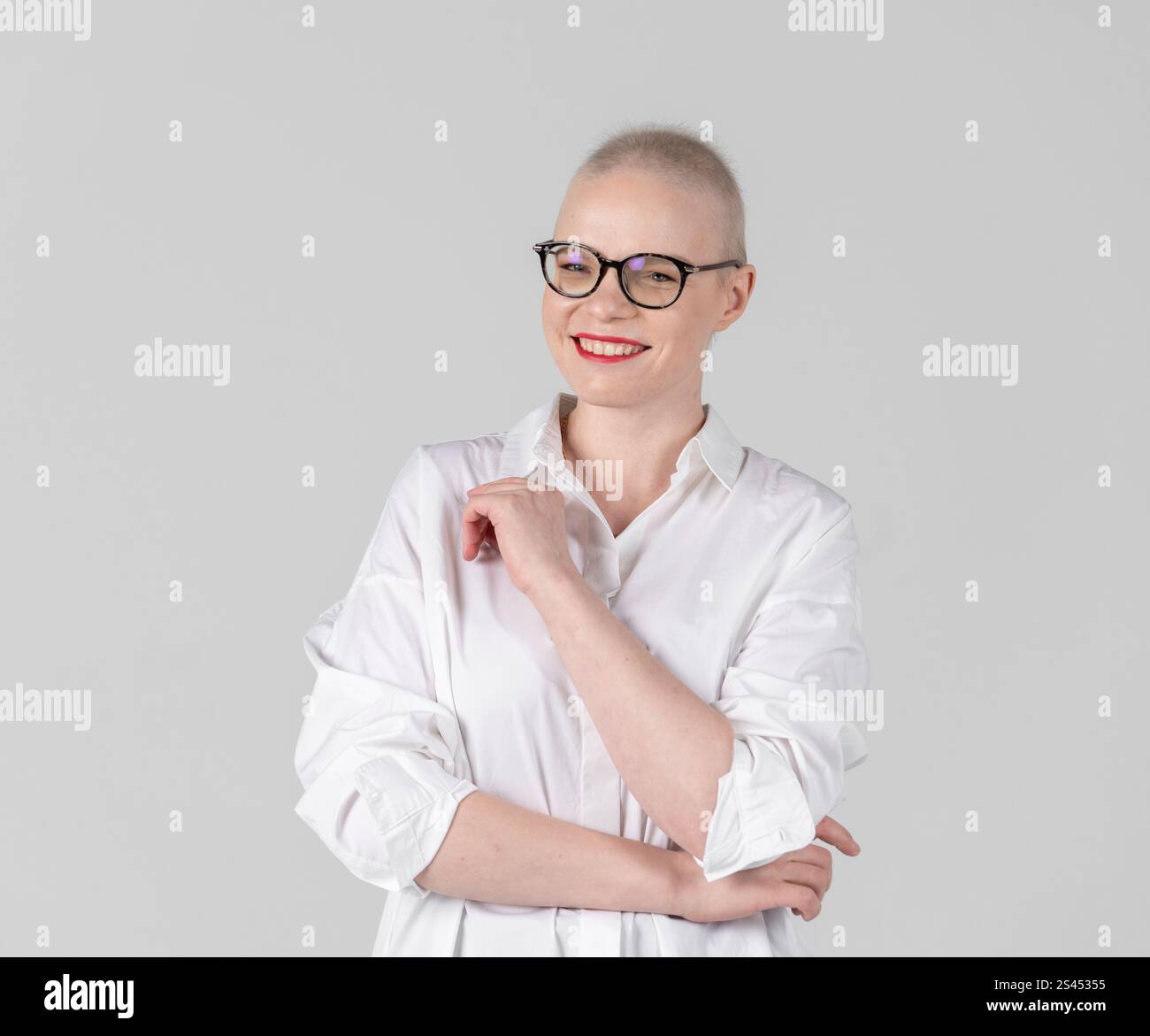 Portrait of a beautiful young caucasian woman with shaved head. Female ...