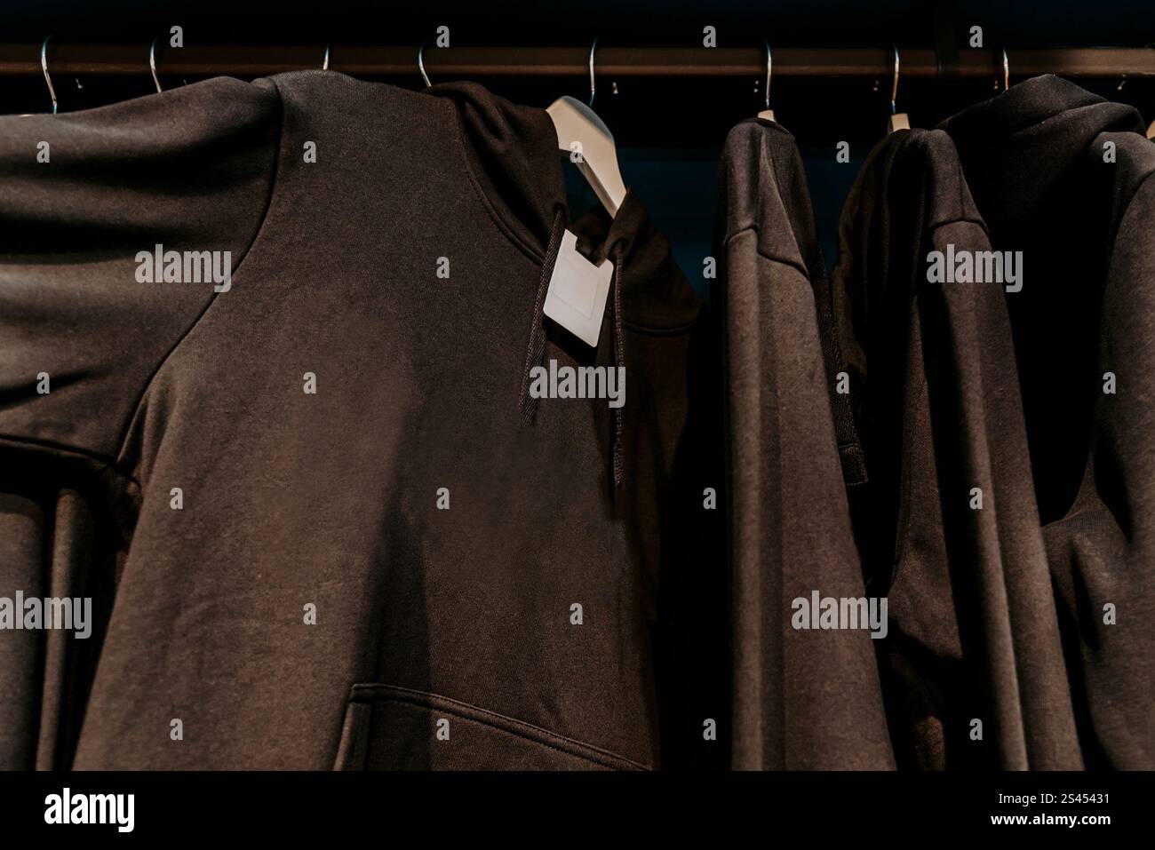 Market sells local traditional clothes, fabrics are on the shelf of the ...