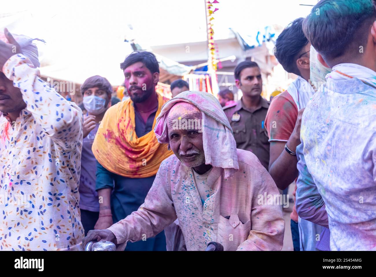 Group of hindu male from nandgaon in traditional clothes and colorful ...