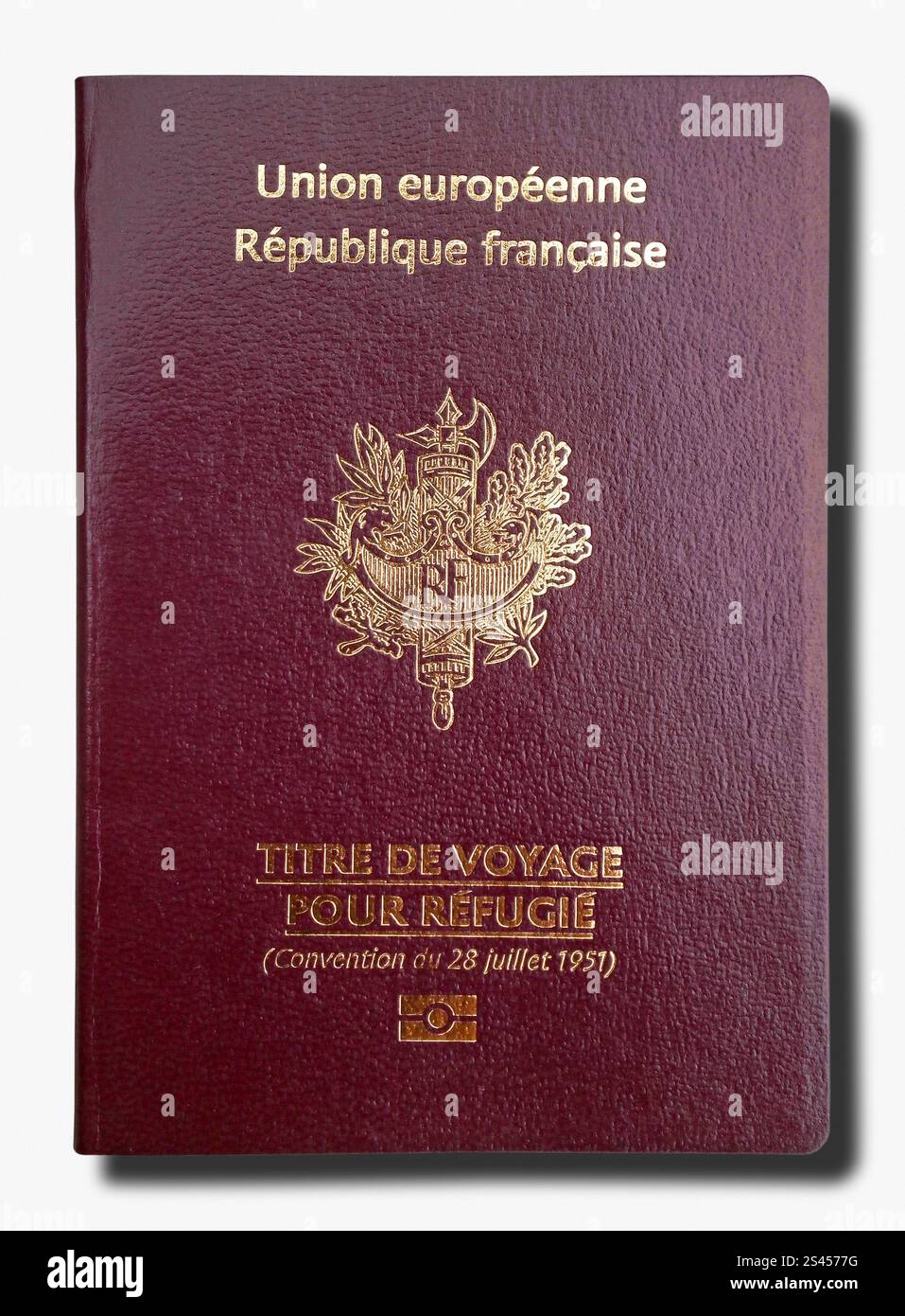 Close-up on a French passport for refugees isolated on a white ...