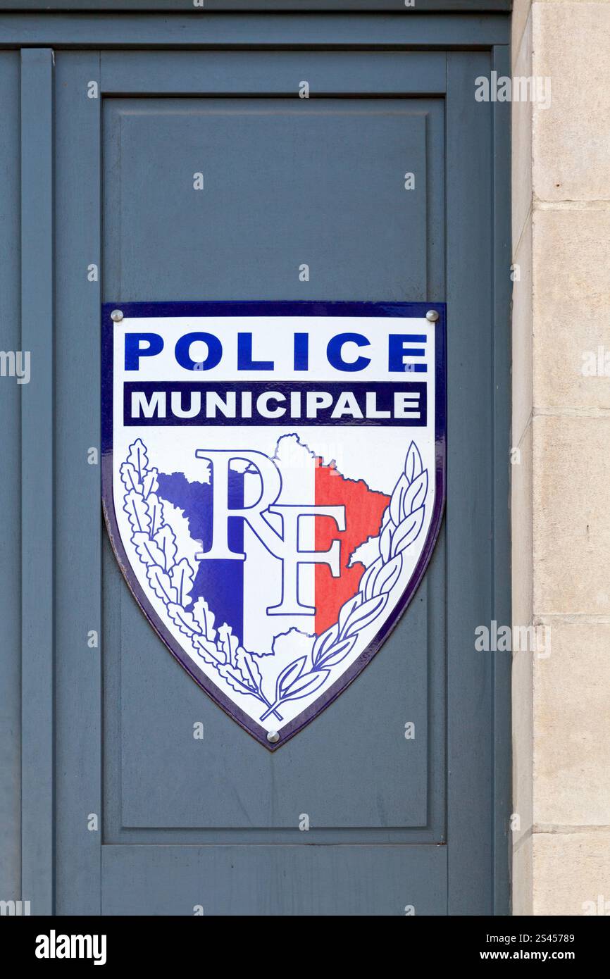 Police Municipale sign fixed on the entrance door of a french police ...