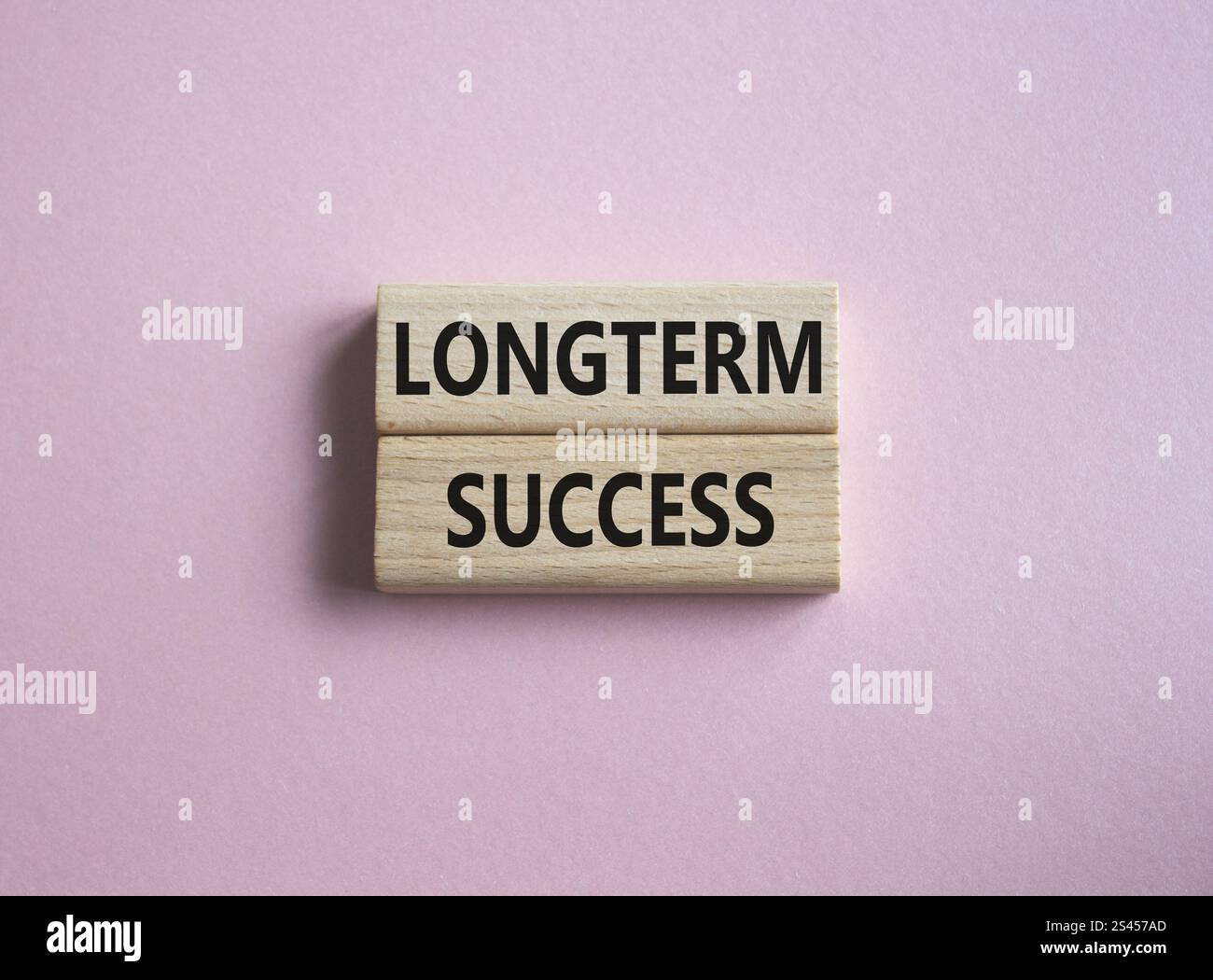 Longterm success symbol. Wooden blocks with words Longterm success ...
