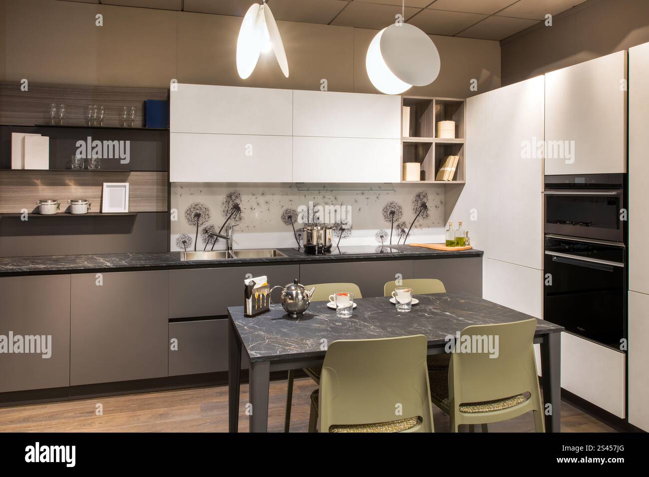 Contemporary kitchen showcasing gray and white cabinets, dandelion ...