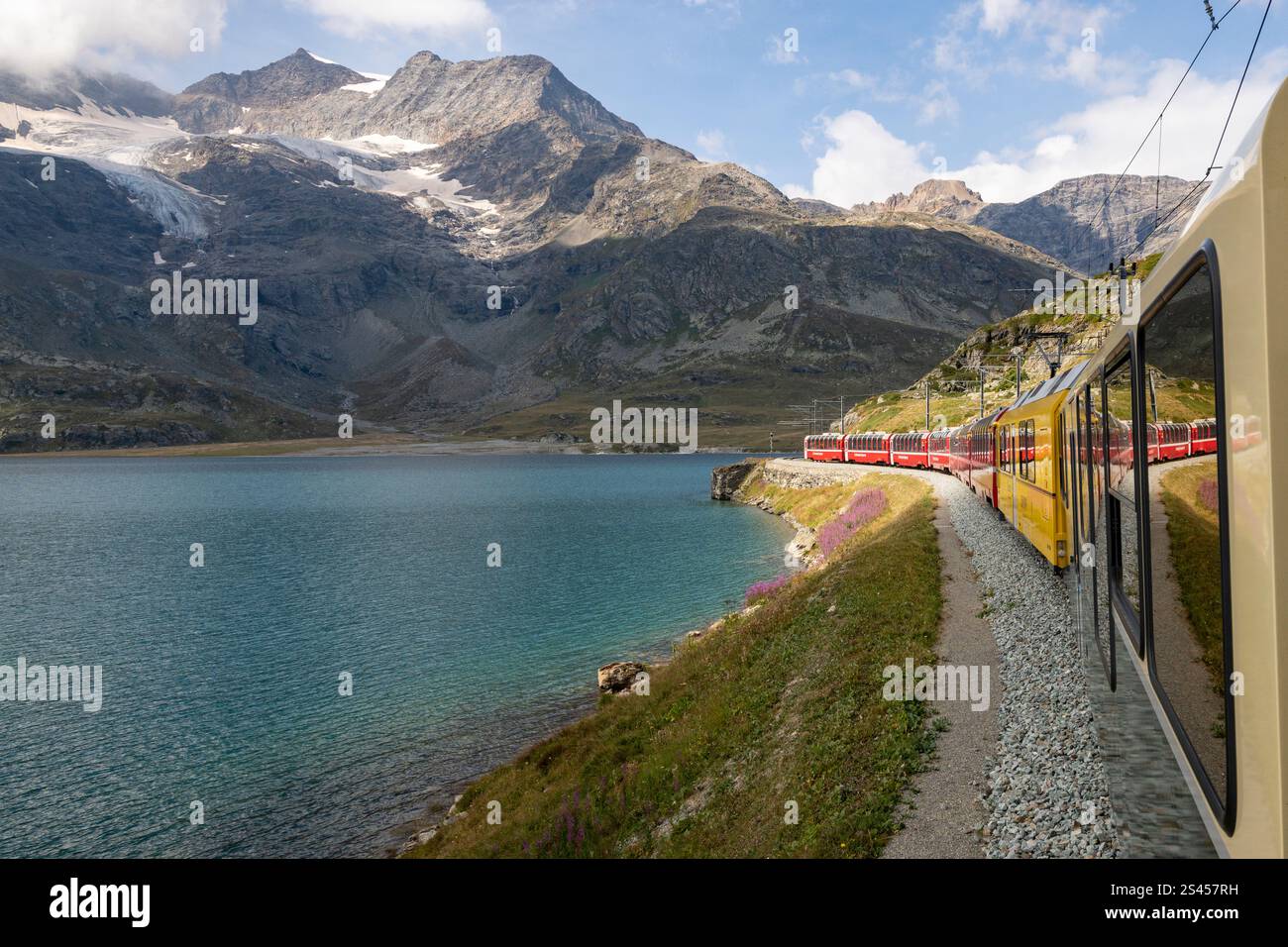 The Bernina Express by the Lago Blanco in the Swiss Alps Stock Photo ...