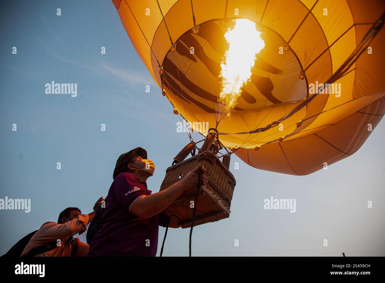 International Balloon Festival, in Chennai, India A pilot uses a burner ...