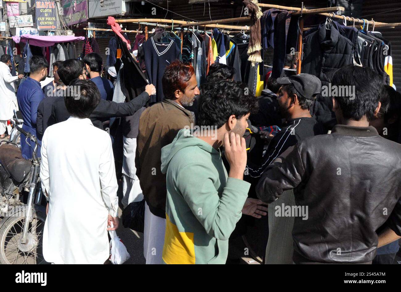 HYDERABAD, PAKISTAN, JAN 10: Warm clothes are being selling at roadside ...