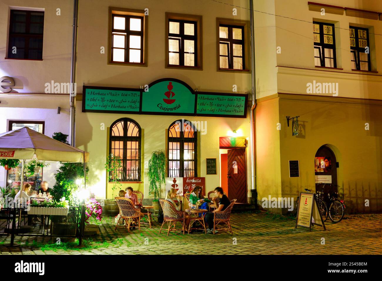Street cafe at the Kazimierz, former jewish quarter of Krakow, Poland ...