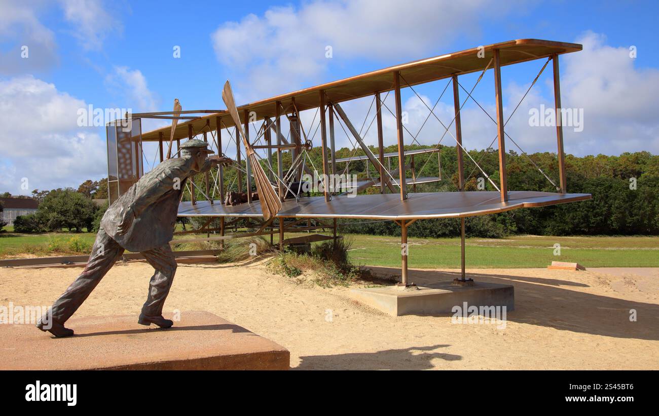 Bronze statue depicting the first flight at the the Wright brothers ...
