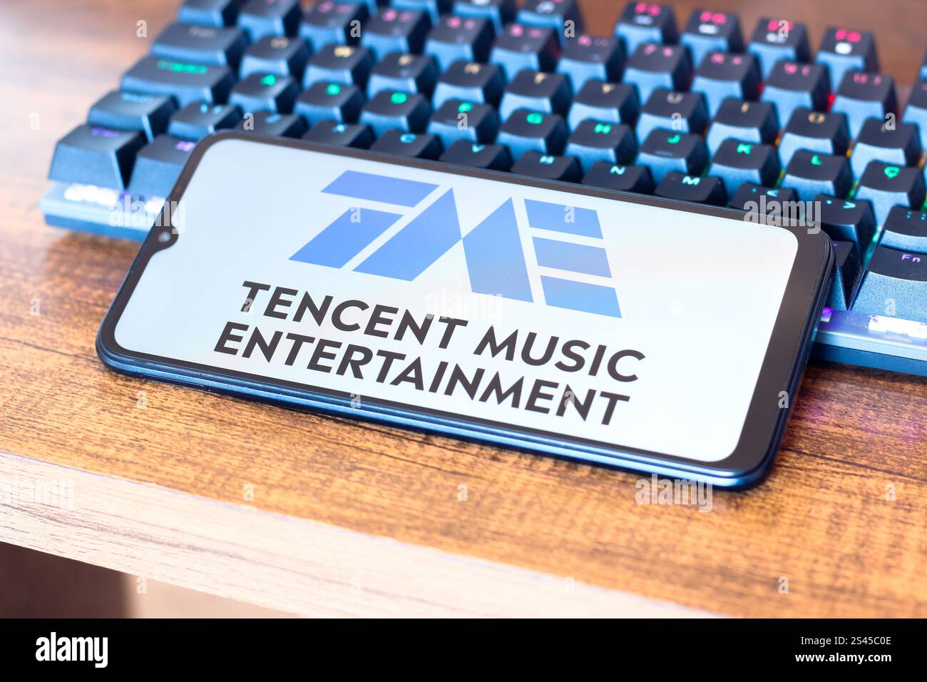 In this photo illustration, the Tencent Music Entertainment (TME) logo ...