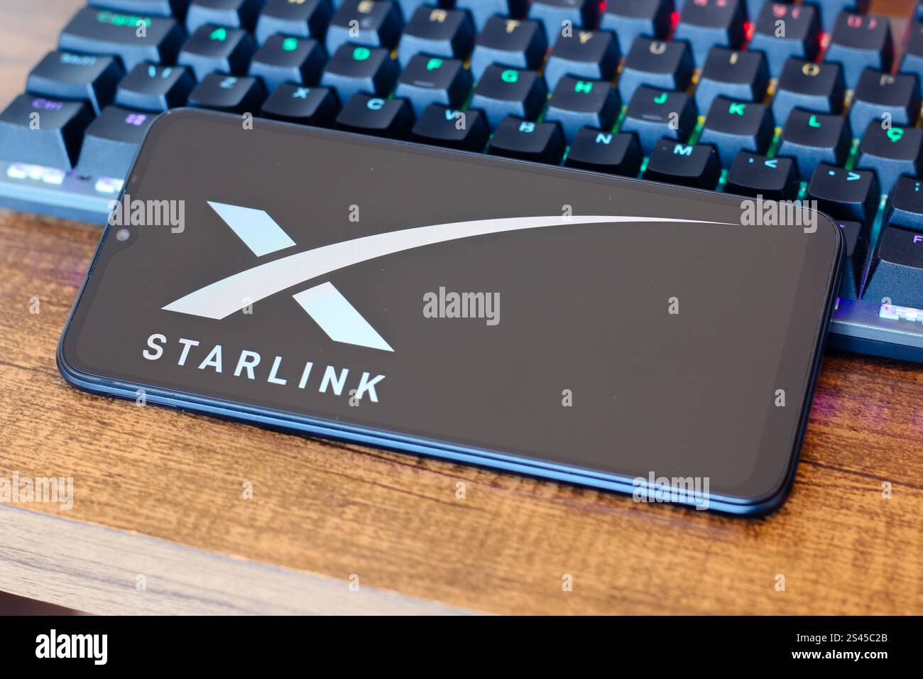 In this photo illustration, the Starlink logo is seen displayed on a ...