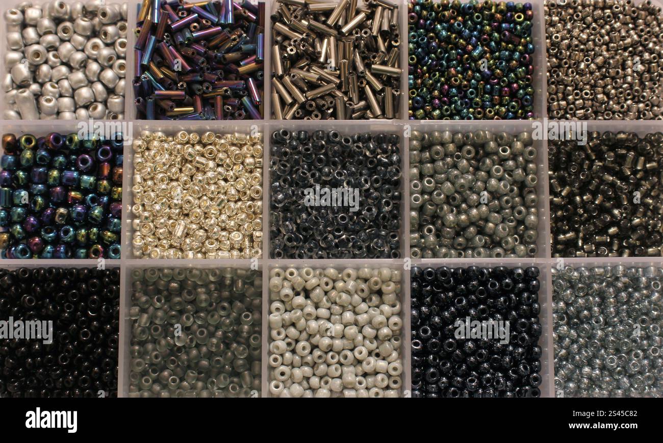 Black and Gray Colored Beads in Container For Jewelry Making Stock ...