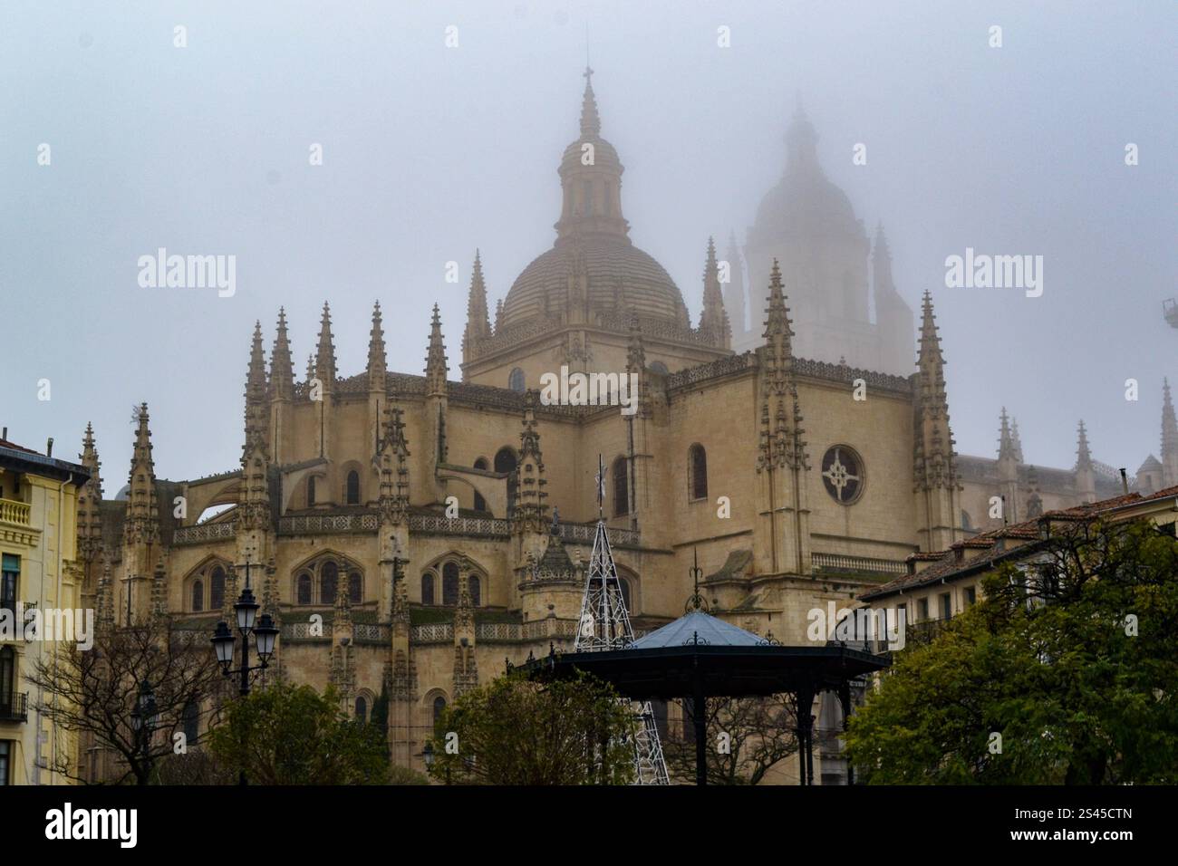 A captivating, misty image of Segovia Cathedral, a stunning example of ...