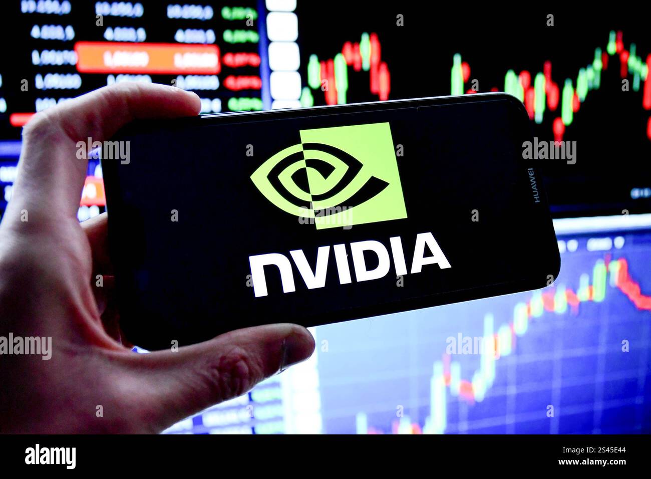 In this photo illustration, the Nvidia company logo is seen displayed ...