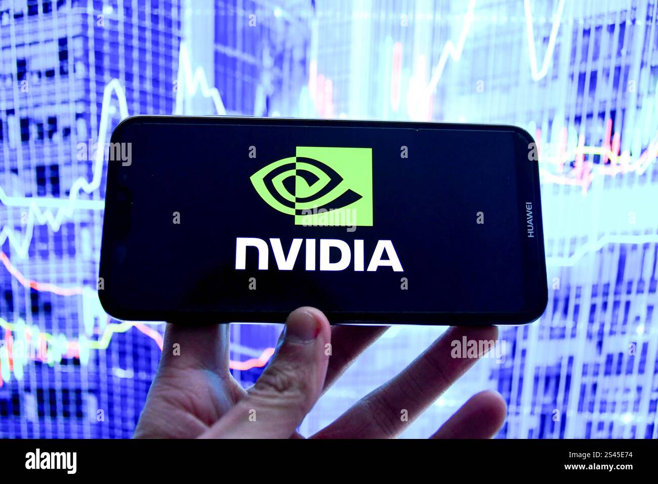 In this photo illustration, the Nvidia company logo is seen displayed ...