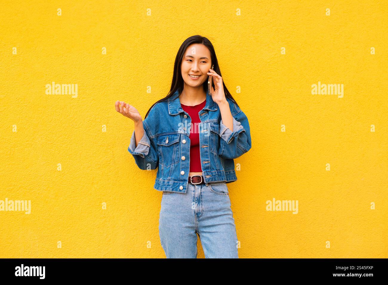 Amazed emotional Korean Asian young woman Generation Z in casual wear ...