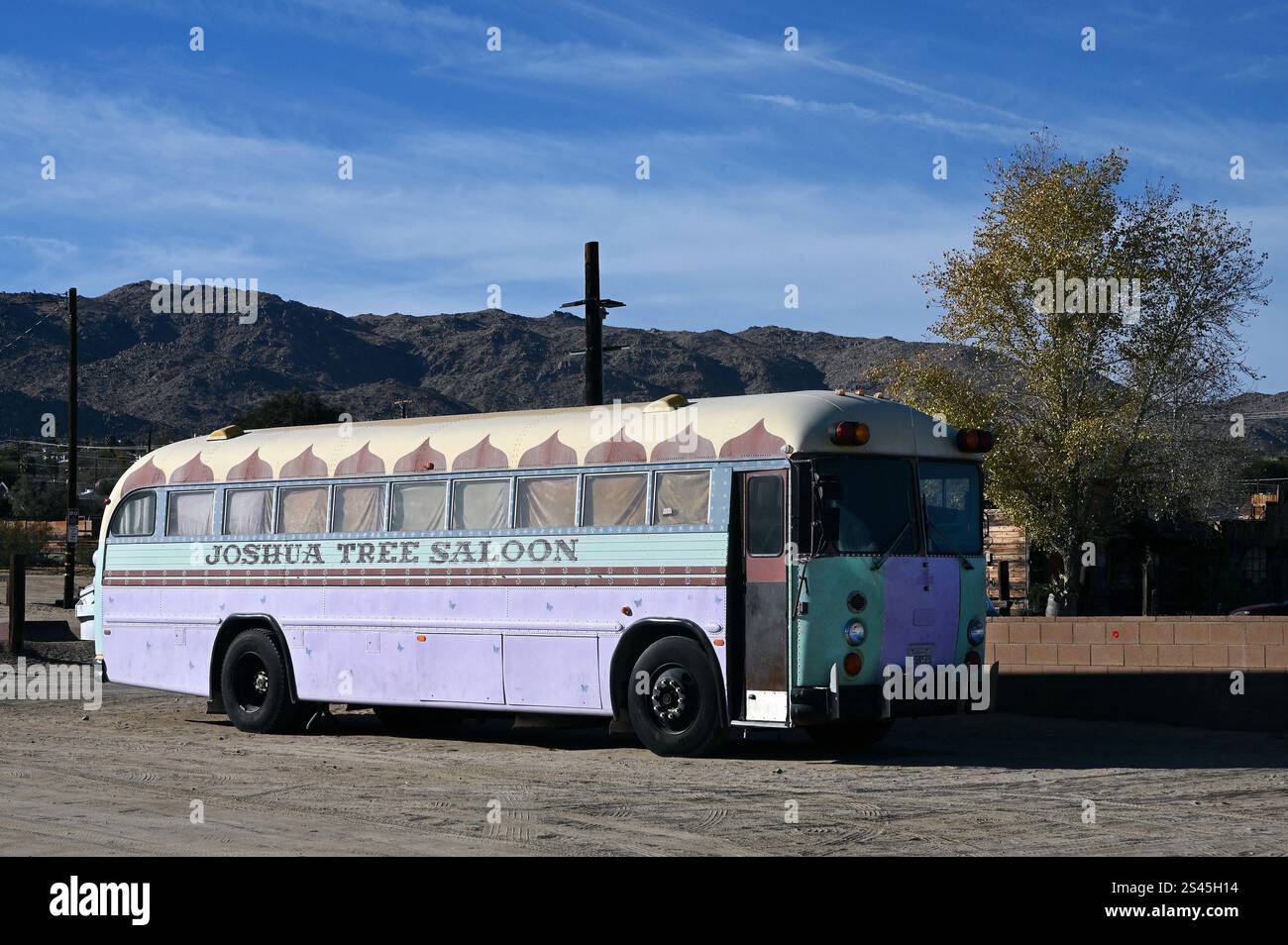 Old hippie bus of the Joshua Tree Saloon, Joshua Tree, California, USA ...