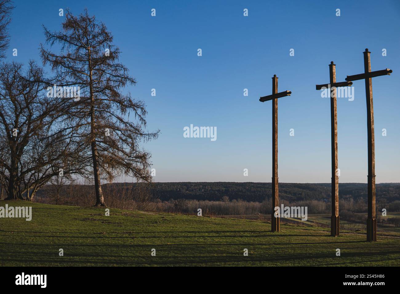 landscape with three crosses standing on the side of a cliff Stock ...