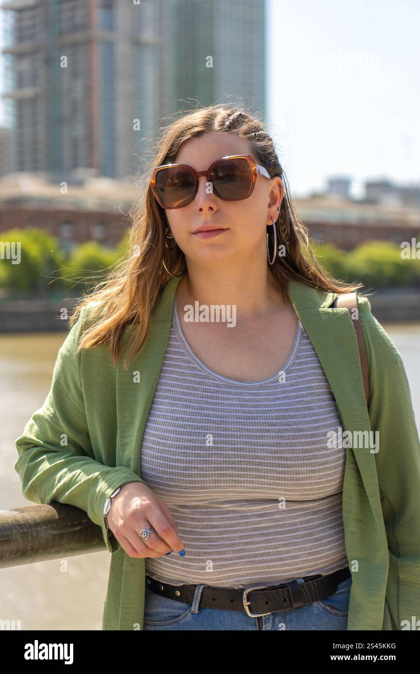 Woman wearing green tank top hi-res stock photography and images - Alamy