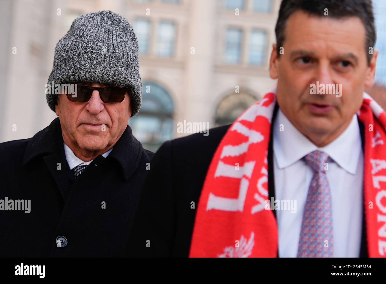 Erden Arkan, left, leaves federal court, Friday, Jan. 10, 2025, in New ...