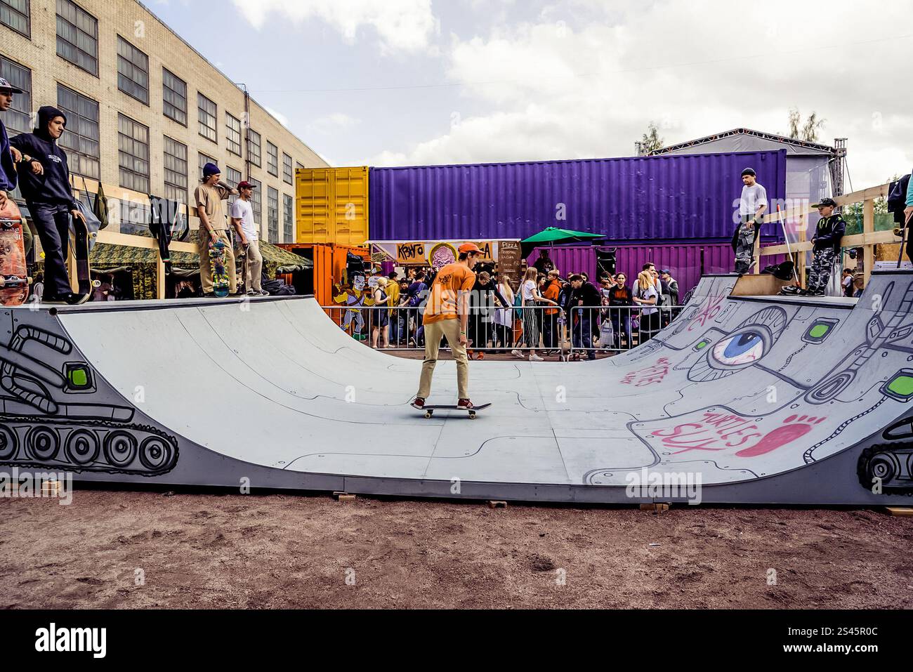 Skateboard contest is an outdoor competition in a skatepark, young ...