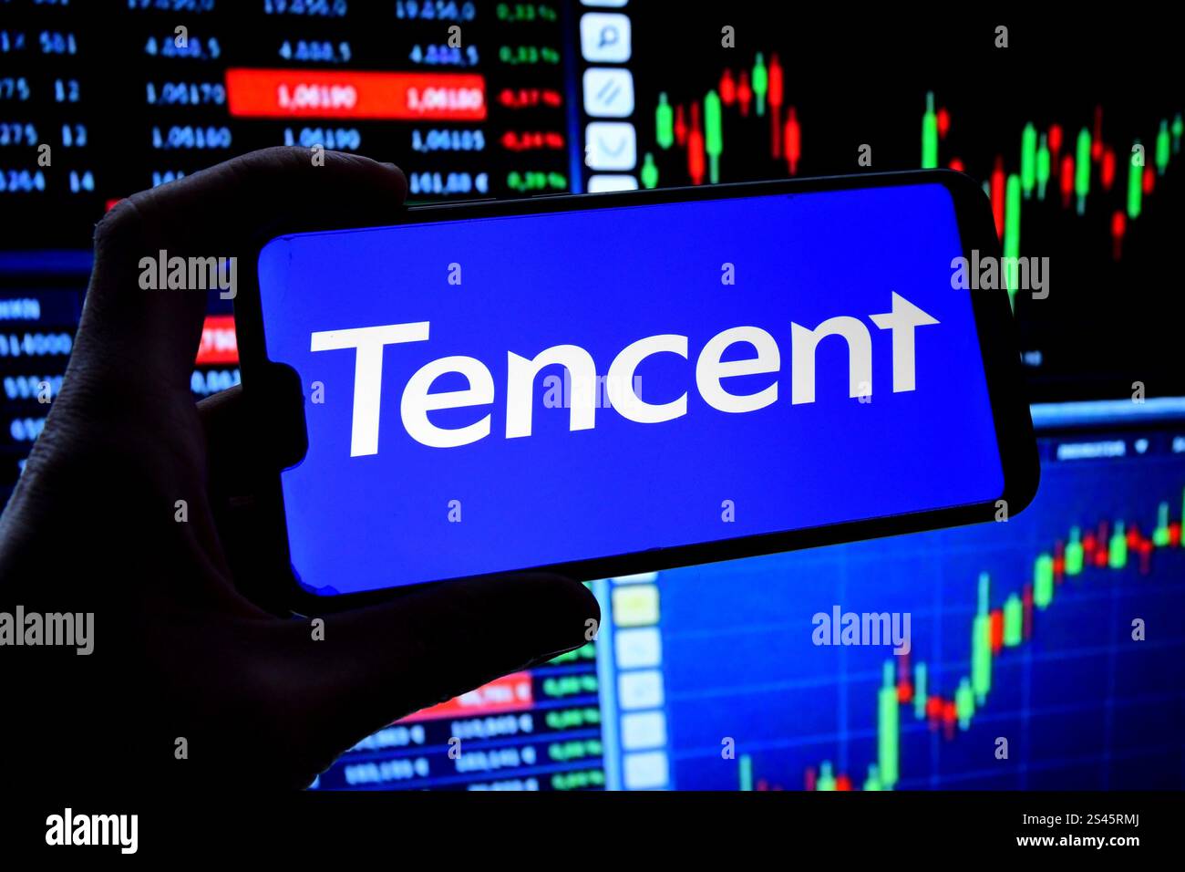 In this photo illustration, a Tencent company logo is displayed on a ...