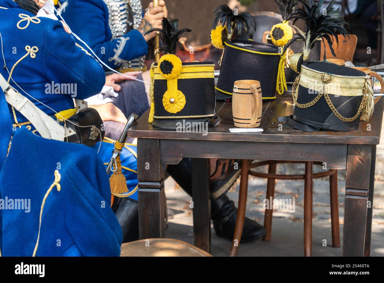 Hungarian Hussar Hats on Table with Traditional Blue Uniforms Stock ...