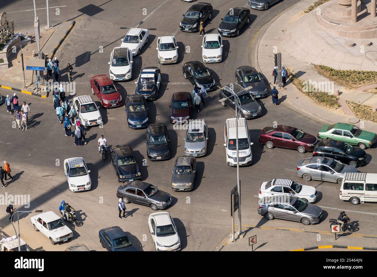 Cairo, Egypt - 29 October 2024: People trying to cross the road in ...