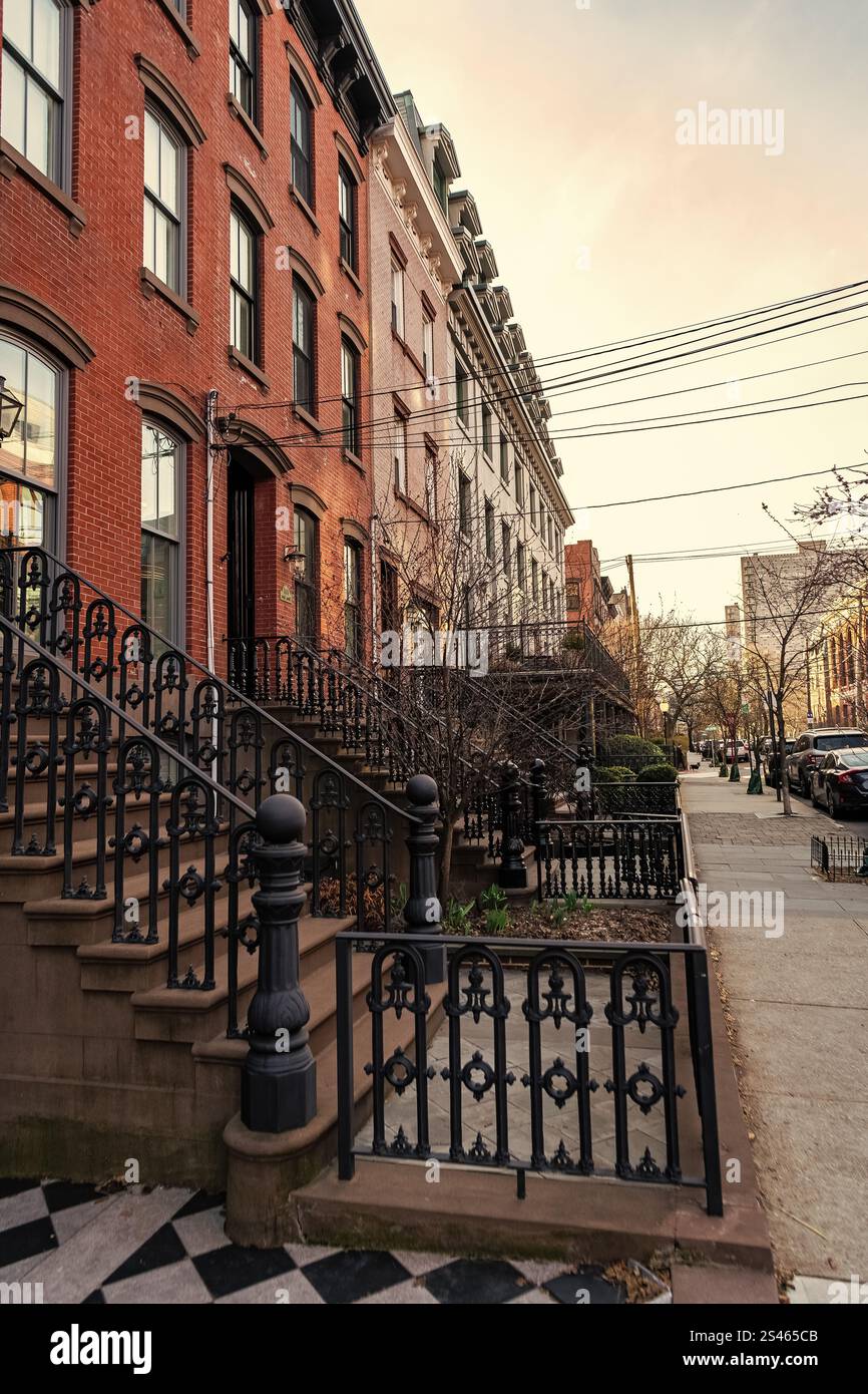 Entrance stairs to brick brownstone building. Architectural exterior ...