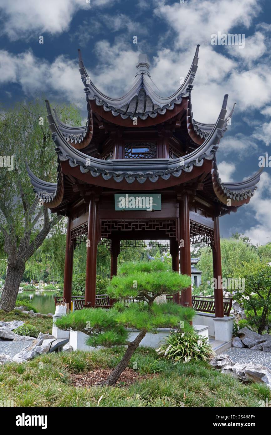 The Pavilion of the Three Friends (San You Ge) surrounded by trees and ...