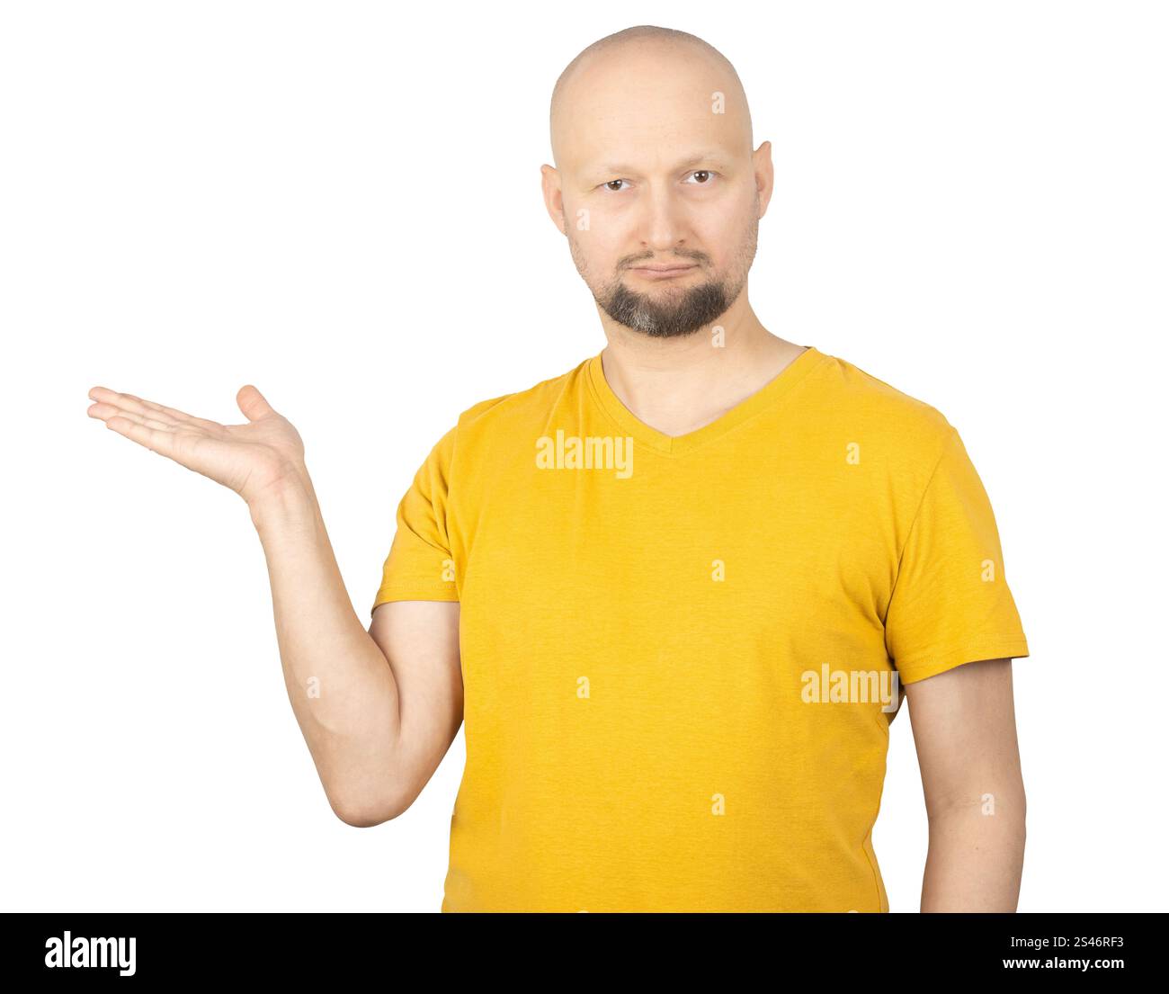 A bald man with a short beard wearing a yellow t-shirt poses against a ...
