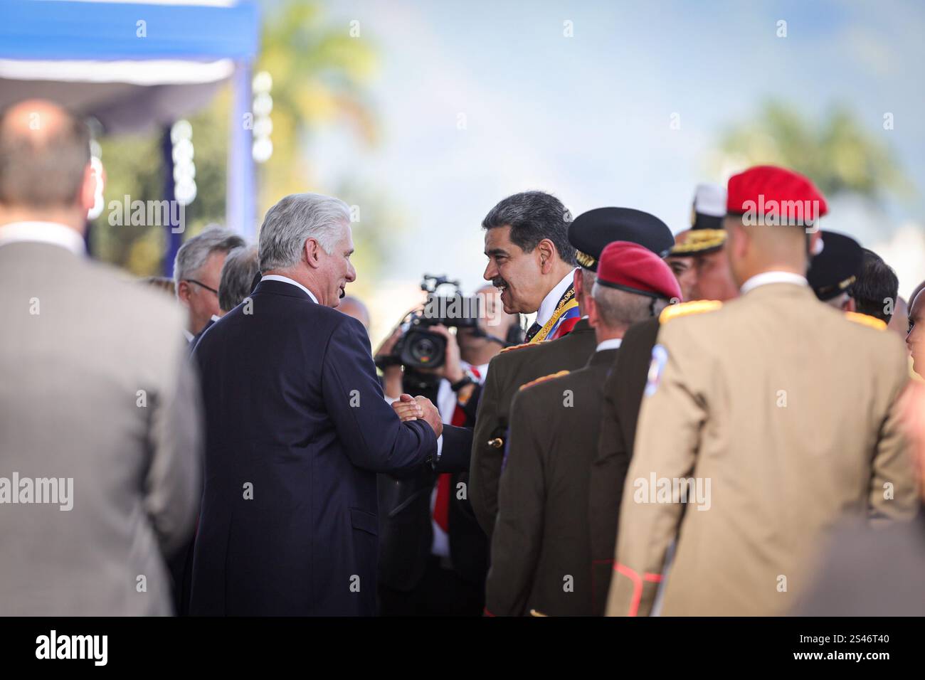 Caracas, Venezuela. 10th Jan, 2025. Nicolas Maduro (r), President of ...
