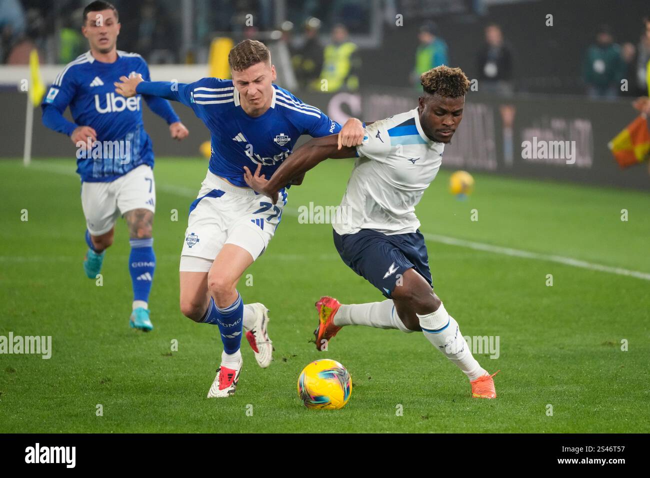 Lazio's Fisayo Dele-Bashiru, right, and Como's Gabriel Strefezza challenge for the ball during ...