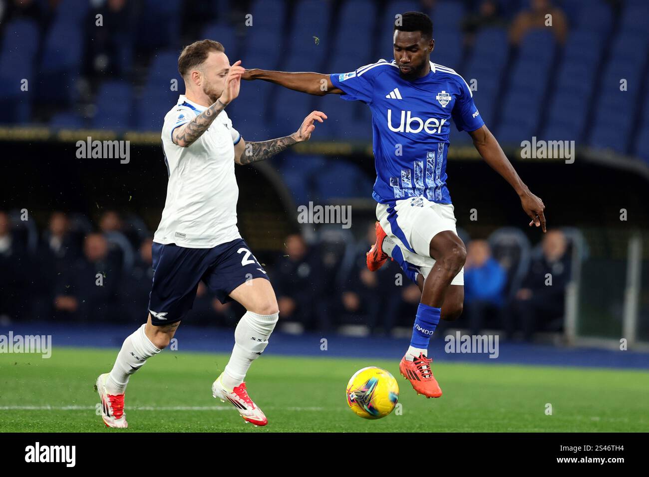 Rome, Italy 10.01.2025 : Manuel Lazzari of Lazio, Alie Fadera of Como during Italian football ...