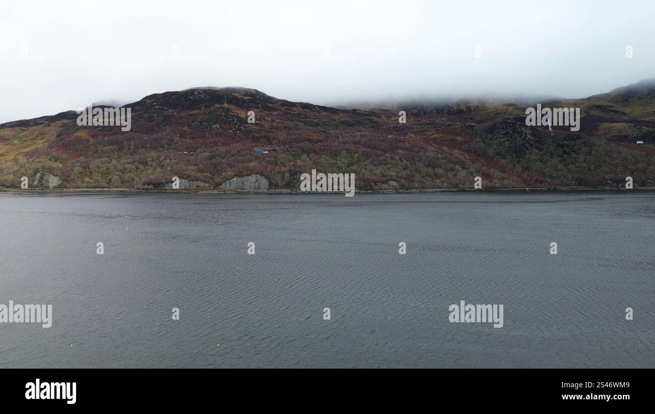 Winter mist shrouding the mountains overlooking Loch Duich in the ...